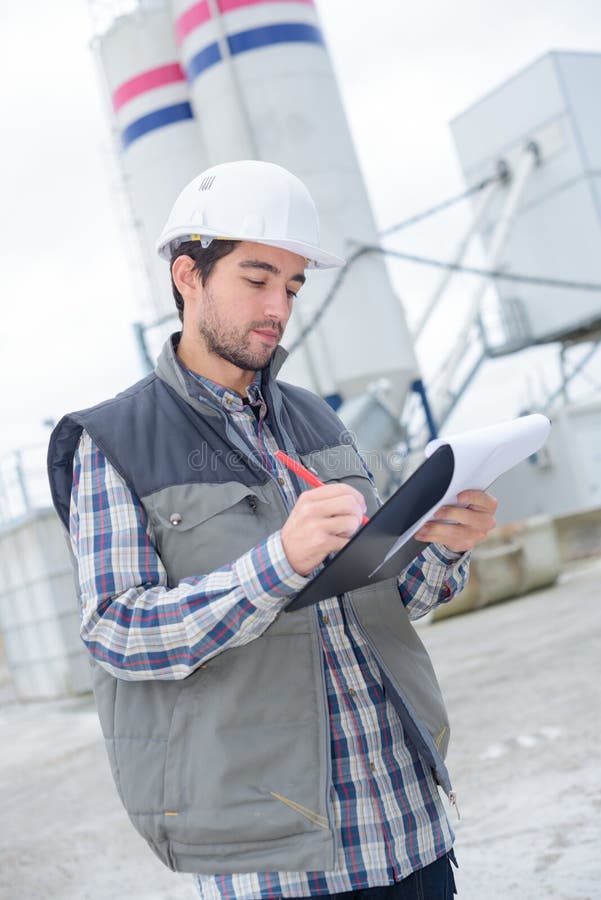 Worker Writing the Information Stock Photo - Image of proportion ...