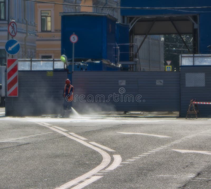 A Worker Washes the Pavement Stock Image - Image of worker, demolition ...