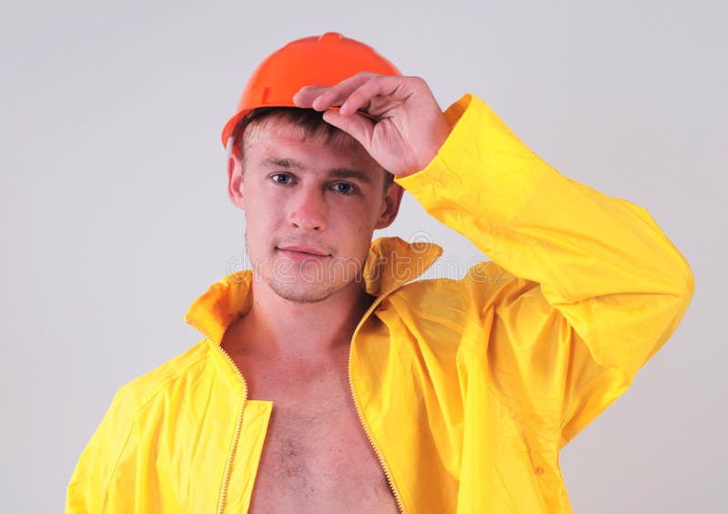 Worker in yellow uniform stock image. Image of manual - 85867689