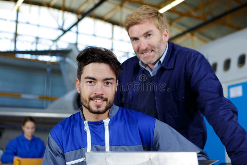 Workers Airliner Factory Posing and Smiling Stock Image - Image of ...
