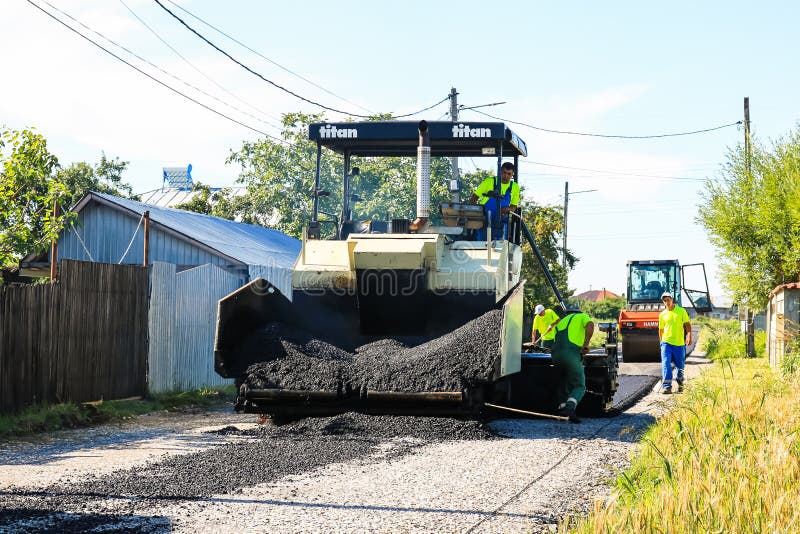 Workers and Asphalting Machines. Construction, Asphalting of New Road ...