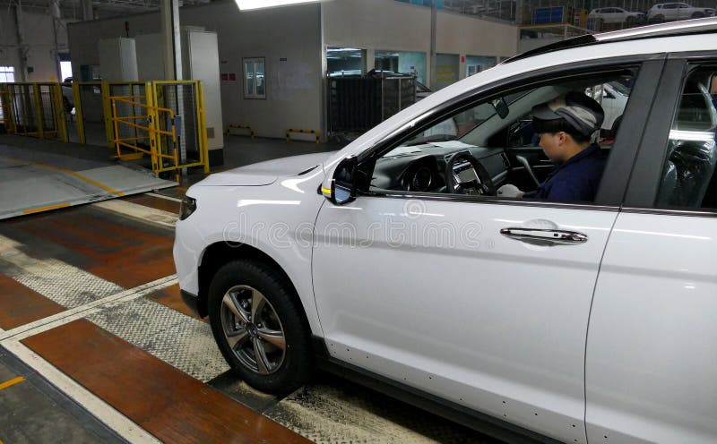 Workers Assemble a Car on Assembly Line in Car Factory Editorial Stock ... Workers Assemble a Car on Assembly Line in Car Factory Editorial Stock ...