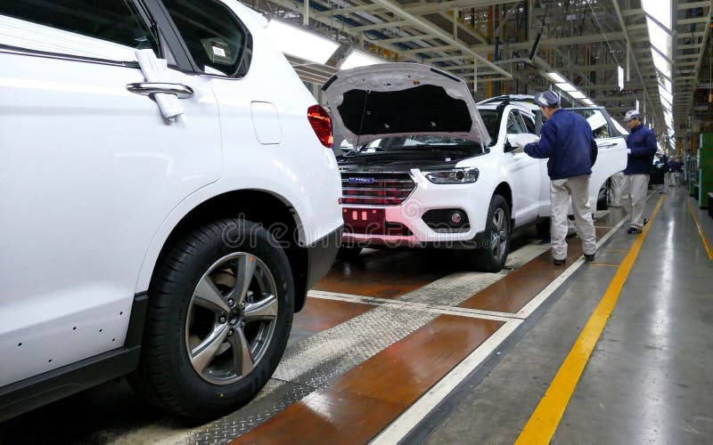 Workers Assemble a Car on Assembly Line in Car Factory Editorial Stock ... Workers Assemble a Car on Assembly Line in Car Factory Editorial Stock ...