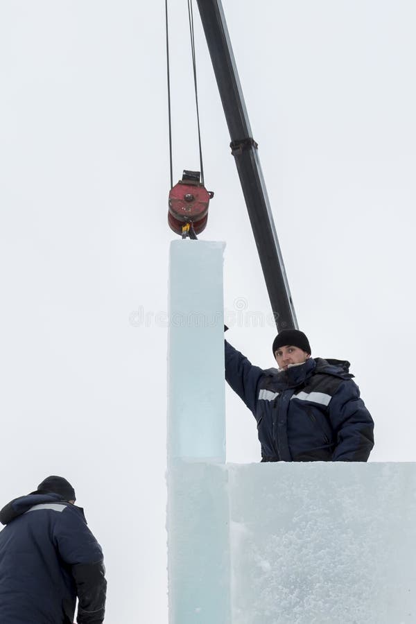 Workers Assemble Ice Blocks on the Frame of a Wooden Slide Stock Image ...