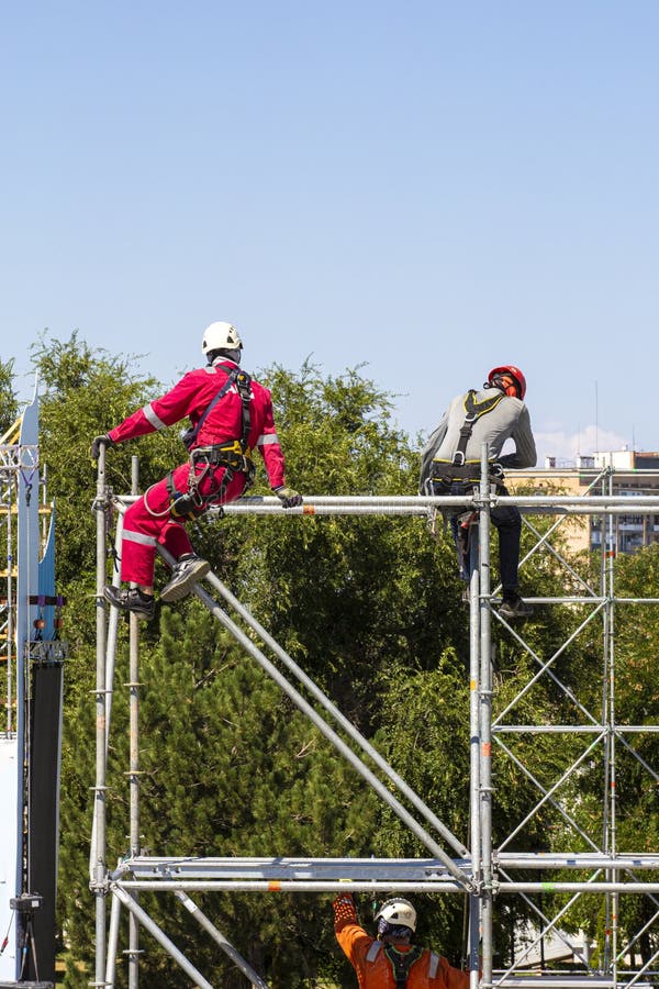 Workers Assemble a Metal Structure at Height Stock Image - Image of ...