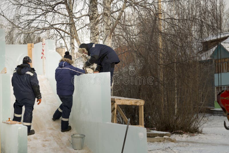 Workers are Assembling Ice Blocks on the Frame of a Wooden Slide Stock ...