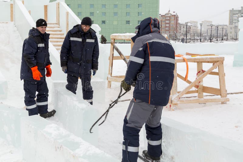 Workers are Assembling Ice Blocks on the Frame of a Wooden Slide Stock ...