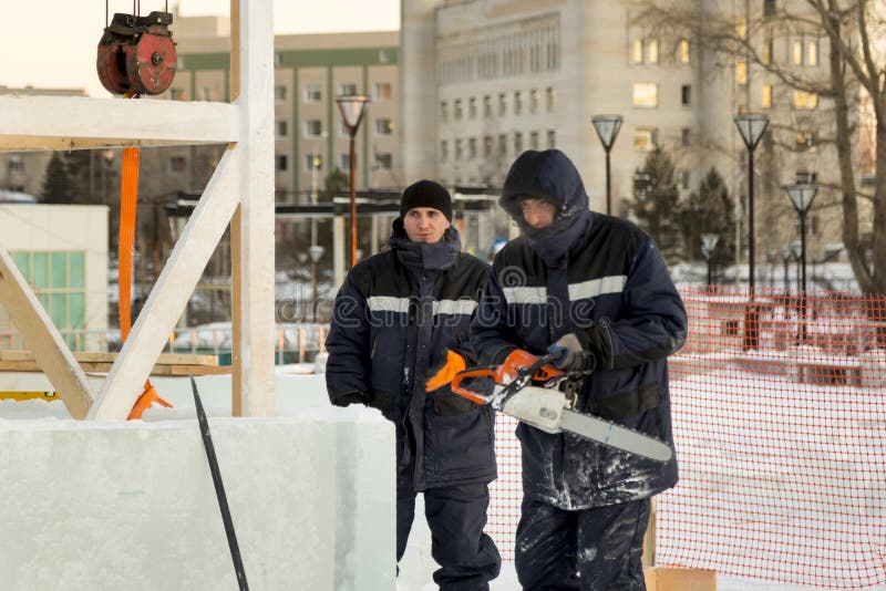 Workers are Assembling Ice Blocks on the Frame of a Wooden Slide Stock ...
