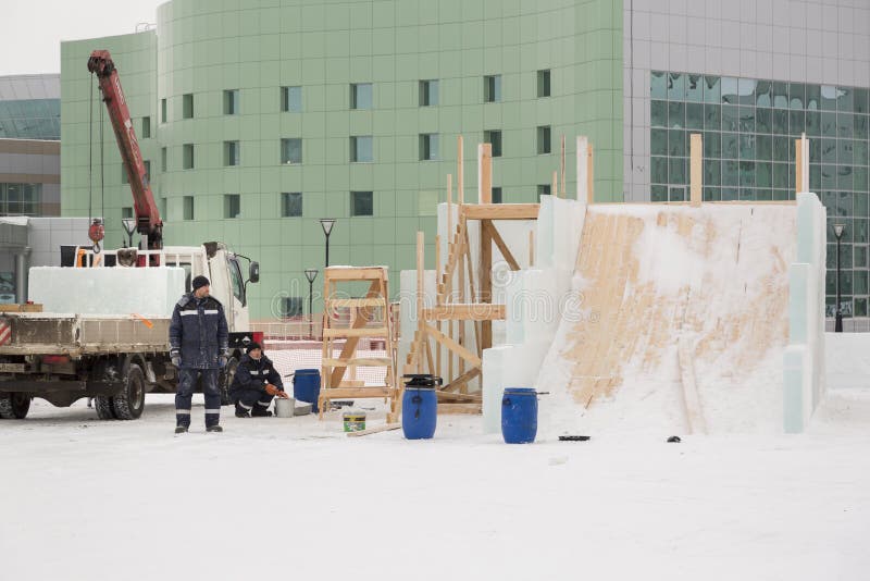Workers are Assembling Ice Blocks on the Frame of a Wooden Slide Stock ...
