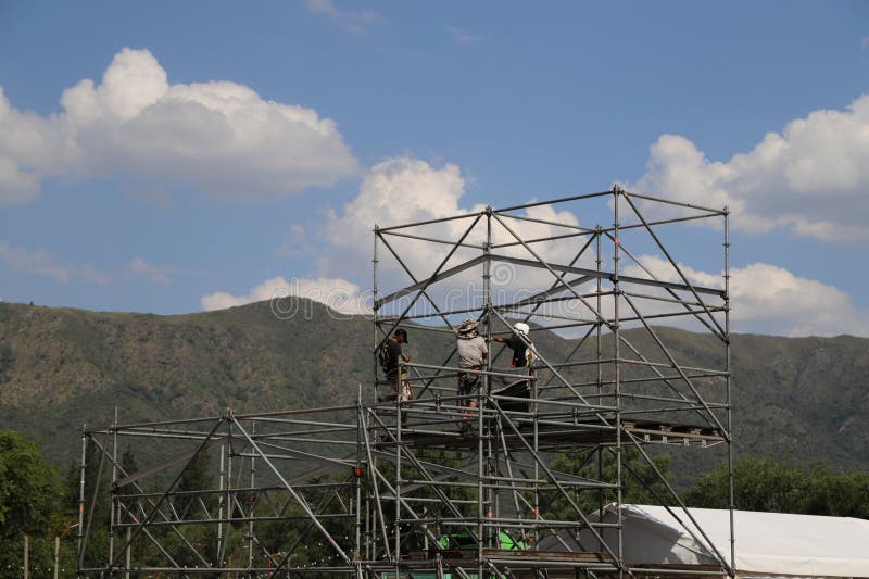 Workers Assembling Pipe Structure for Outdoor Stage Stock Image - Image ...