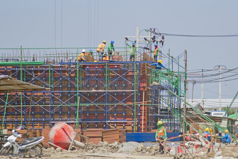 Workers in a Baskets are Installing Sheet, Building a Factory ...