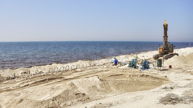 Workers At A Beach Construction Site Between Dubai And Sharjah ...