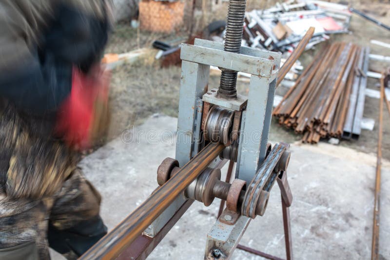 Workers Bending Metal at a Construction Site. Technology Stock Photo ...