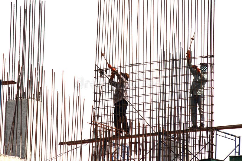 Workers binding steel bars stock photo. Image of iron - 34496412