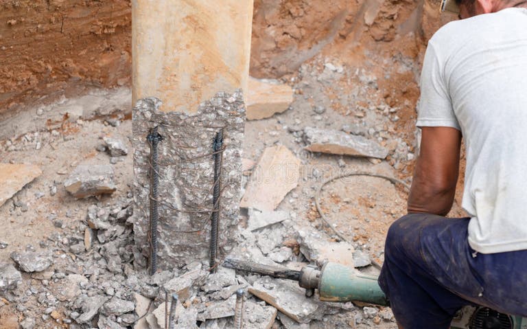 Workers are Breaking Pile Heads Stock Image - Image of labor, remove ...