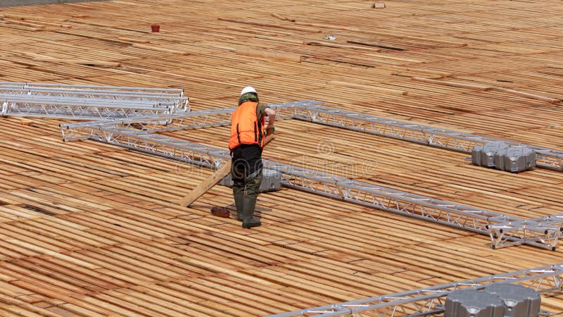Workers Build a Dam of Wood on the River Stock Image - Image of worker ...