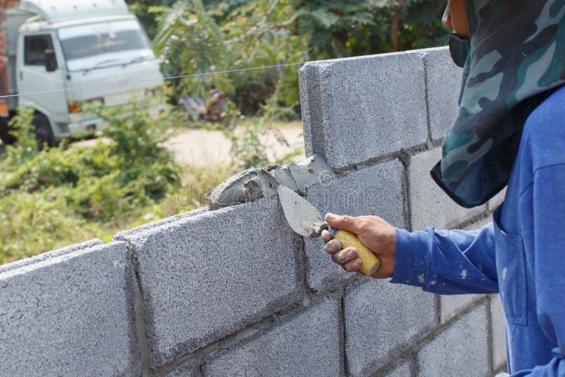 Workers Build a Wall Detail Stock Photo - Image of build, work: 105123594
