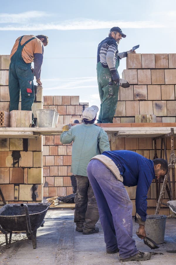 Workers Building a House editorial stock photo. Image of house - 99507423