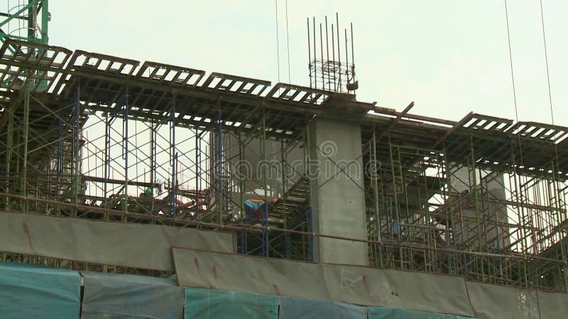 Workers Building the Support of a Tall Structure Stock Video - Video of ...