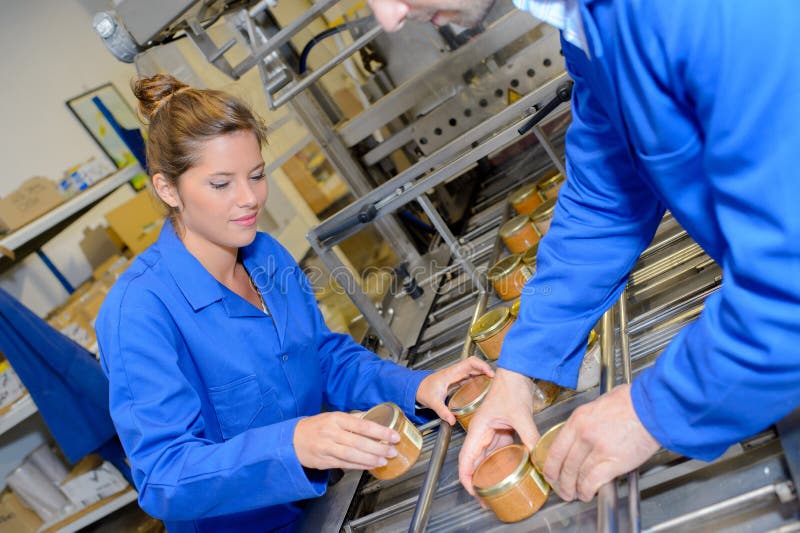 Workers at canning factory stock image. Image of pressure - 173907389