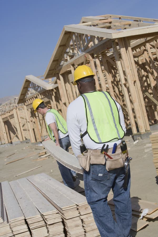 Workers Carrying Wooden Beam Stock Photo - Image of house, plank: 29652538