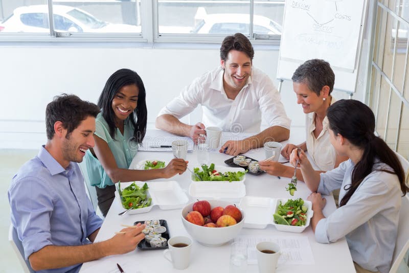 Workers Chatting while Enjoying Healthy Lunch Stock Image - Image of ...
