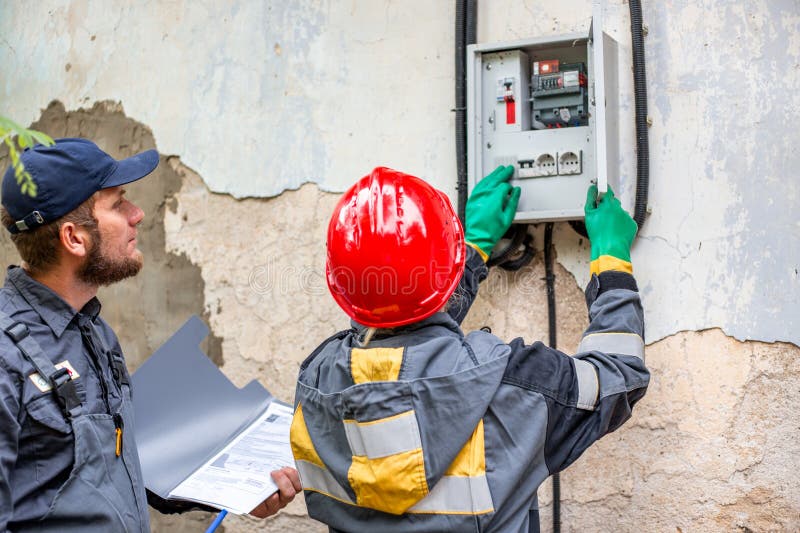 Workers Check the Operation of the Electricity Meter, Check the ...