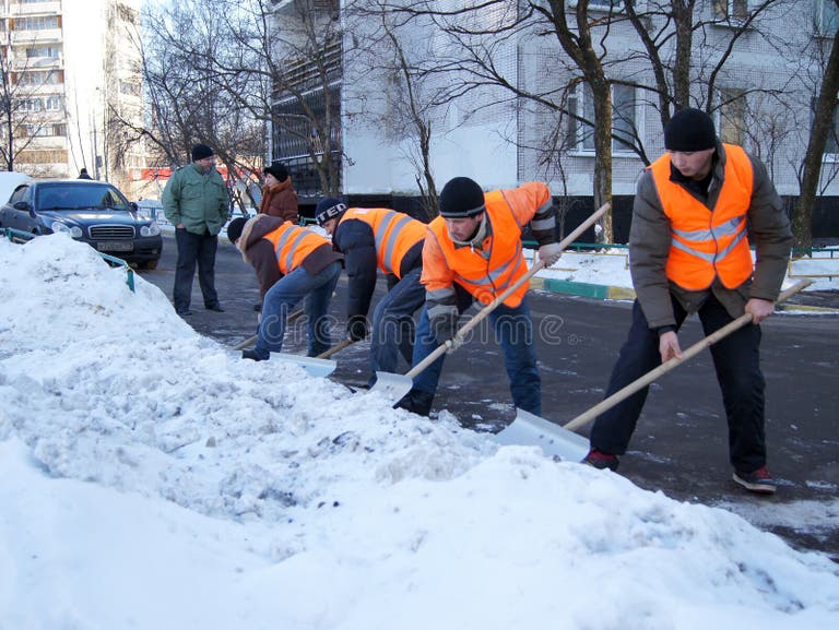 Workers clean snow editorial photography. Image of effort - 23096677