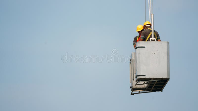Workers Clean the Wall on the Swing Stage. Editorial Image - Image of ...