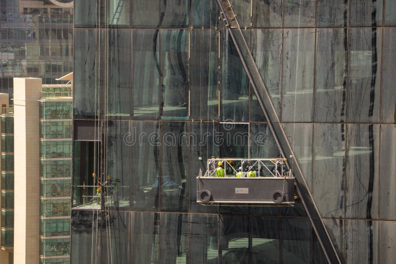 Men Cleaning the Skyscraper Stock Photo - Image of construction, high ...