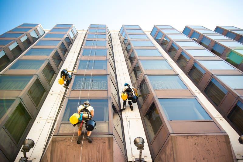 Workers Cleaning the Windows on the Glass Building Editorial Image ...