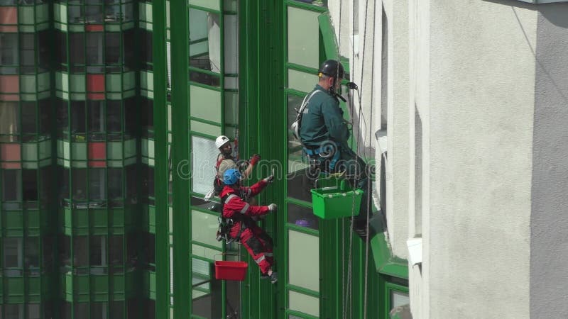 Workers cleaning windows stock footage. Video of high - 282404758