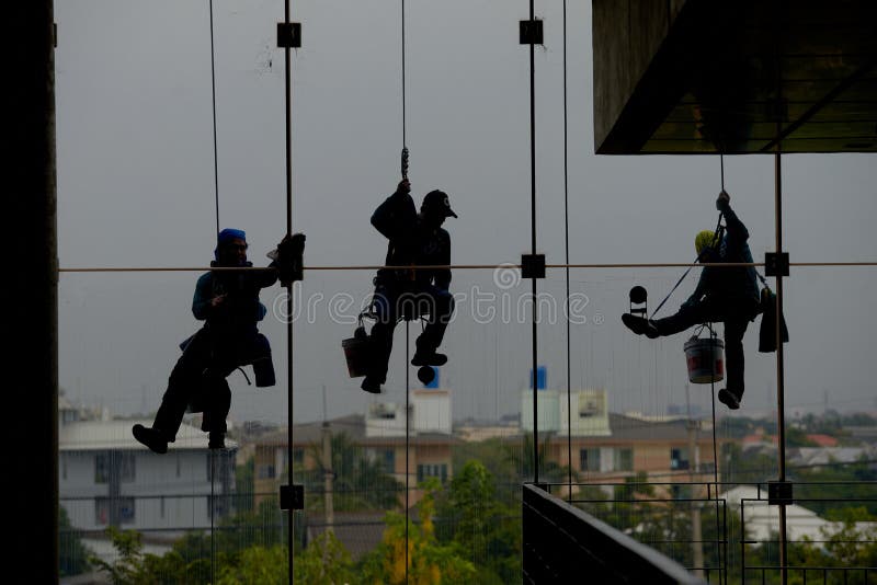 Workers Cleaning Windows Service on High Rise Building Stock Photo ...