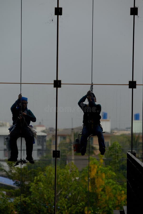 Workers Cleaning Windows Service on High Rise Building Stock Image ...