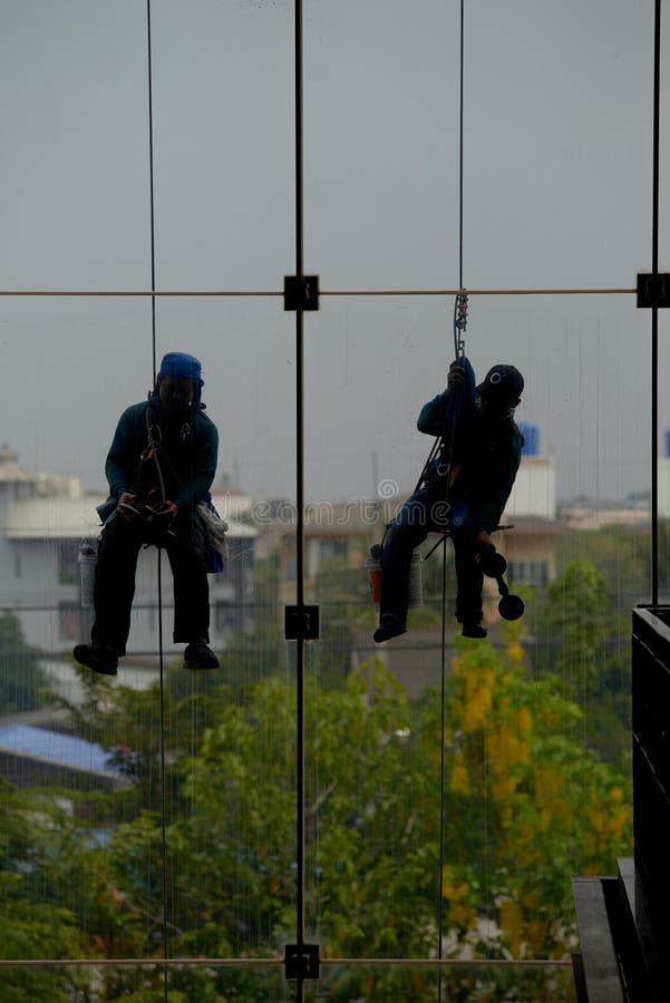 Workers Cleaning Windows Service on High Rise Building Stock Image ...