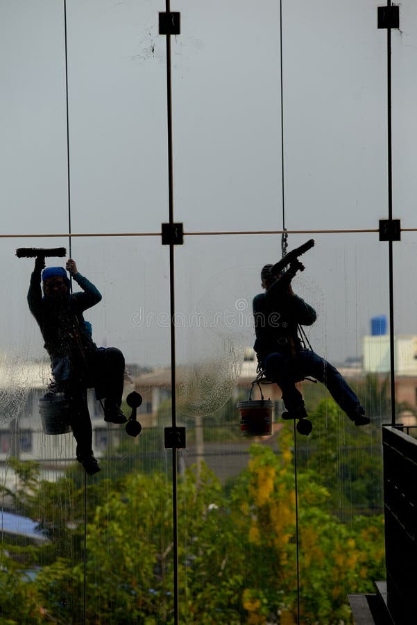 Workers Cleaning Windows Service on High Rise Building Stock Image ...