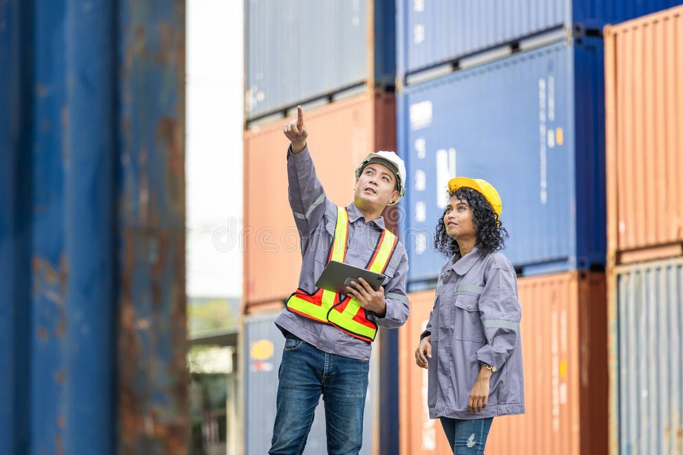 Workers Collaborating at Shipping Container Yard, Supervisor in Safety ...