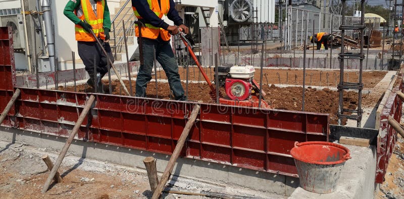 Workers are Compacting the Soil Editorial Stock Image - Image of gravel ...