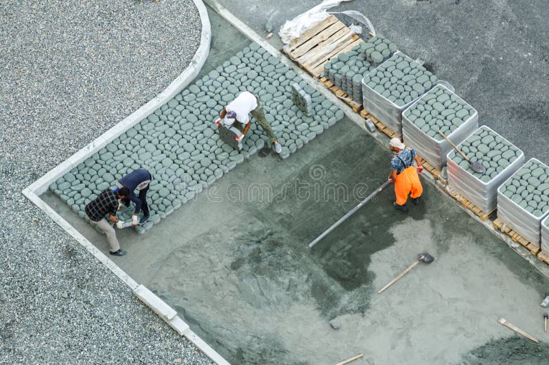 Workers Constructing Pavement Editorial Stock Image - Image of stone ...