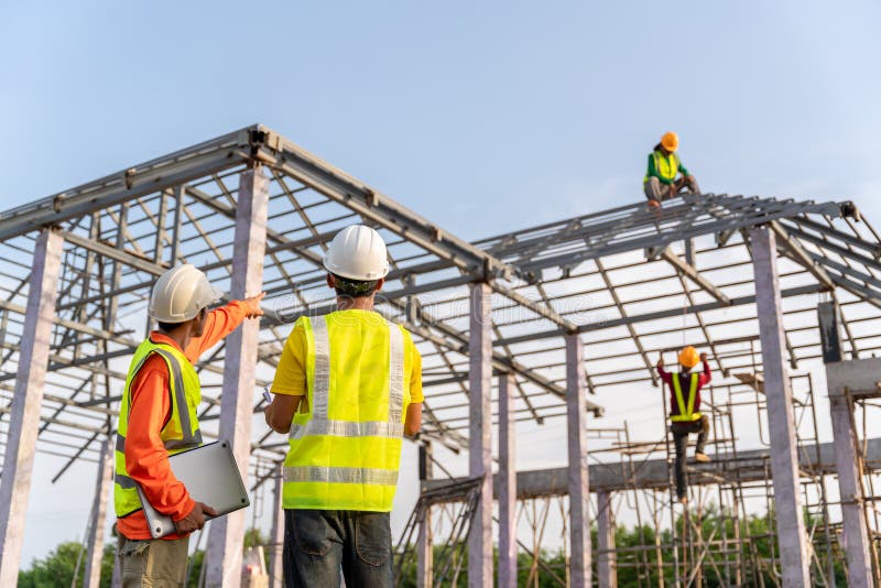4 Workers in Construction Site, Architect and Engineer Watching ...