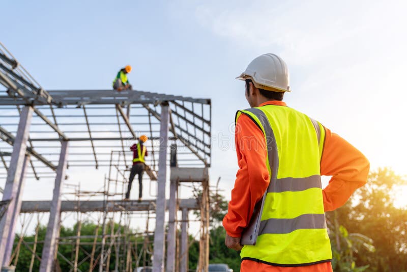 3 Workers in Construction Site, Engineer Technician Watching Team of ...