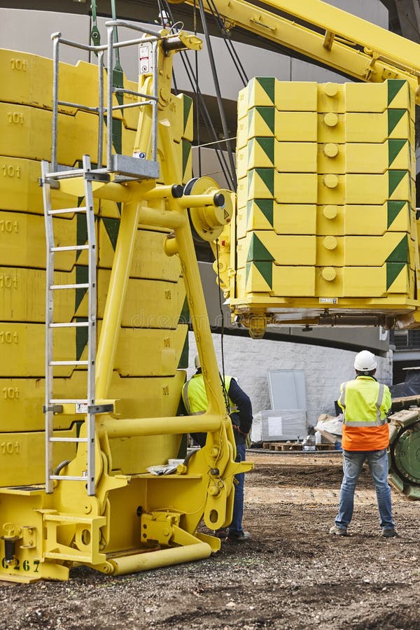 Workers on a Construction Site. Engineering and Architectural ...