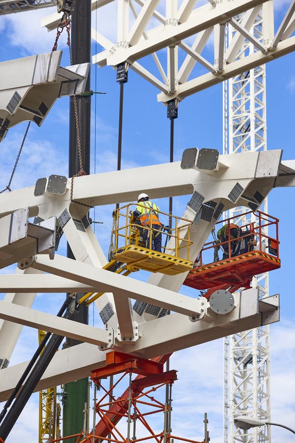 Workers on a Construction Site. Engineering and Architectural ...