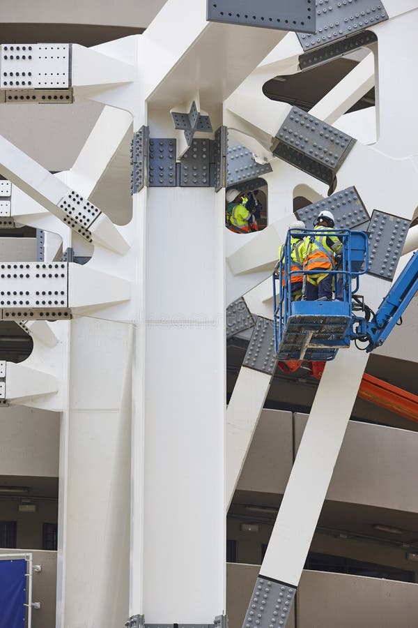 Workers on a Construction Site. Engineering and Architectural ...