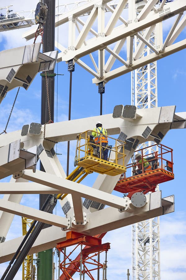 Workers on a Construction Site. Engineering and Architectural ...