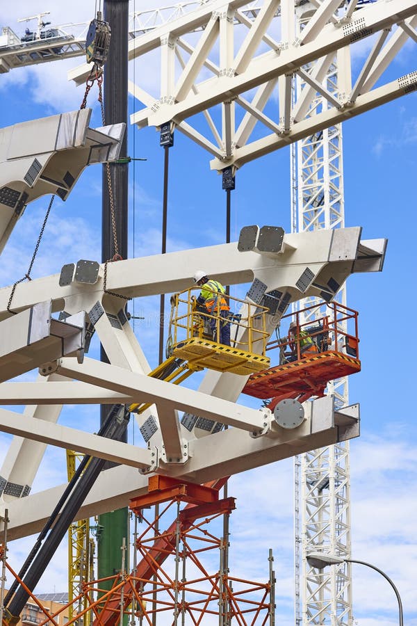 Workers on a Construction Site. Engineering and Architectural ...