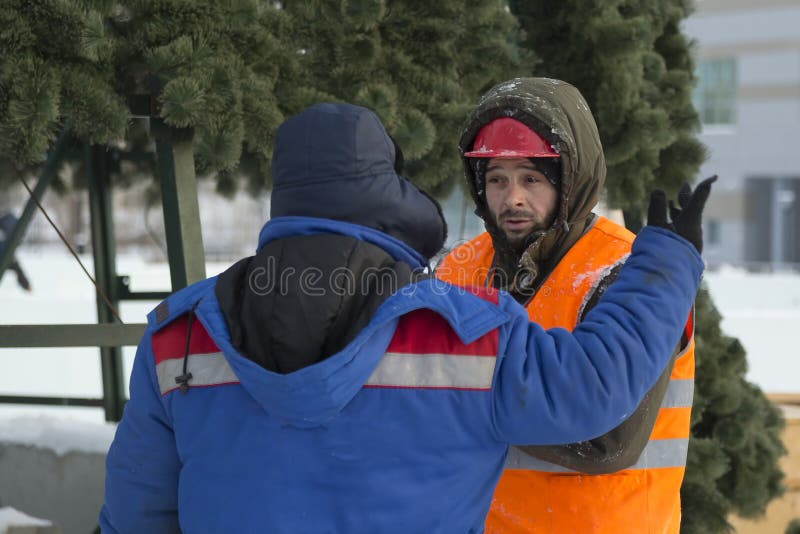 Two Workers Talk on the Assembly Site Stock Image - Image of happiness ...
