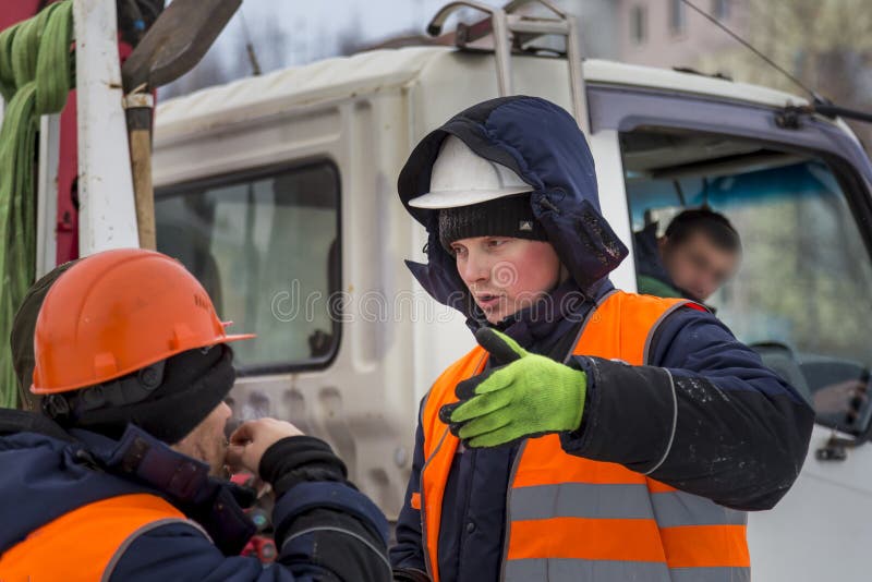 Two Workers Talk on the Assembly Site Stock Image - Image of happy ...