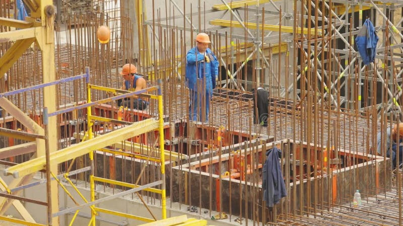 Workers at a Construction Site. People are Working on the Construction ...