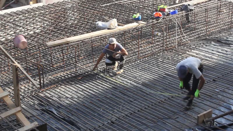 Workers at Construction Site Install a Rubber Coating Stock Footage ...